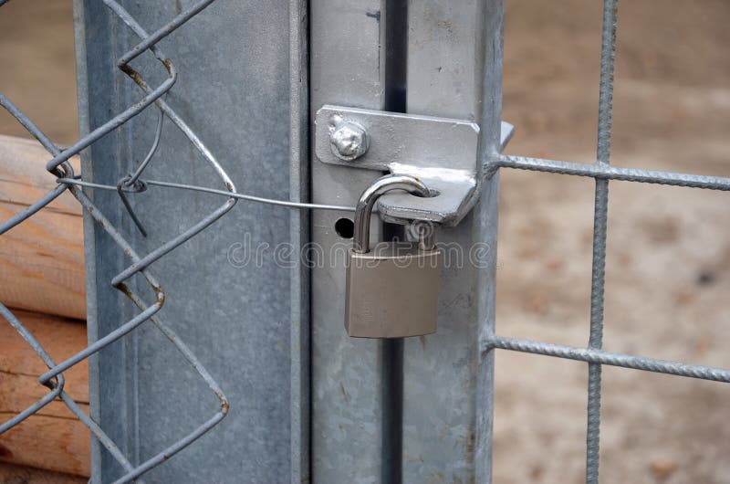 Metal Padlock Locking New Metal Gate and Fence Stock Image - Image of ...