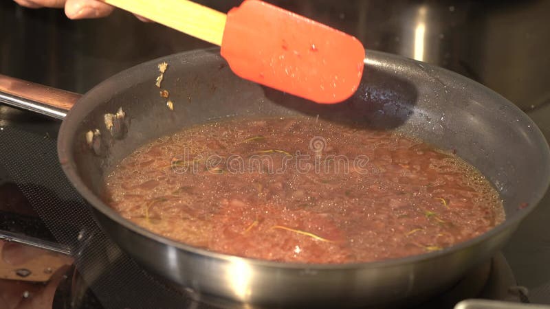 Simmering Raw Pork in Metal Pan on Electric Stove Stock Footage - Video ...