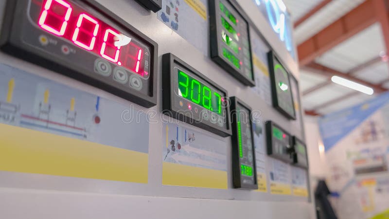 Metal Panel with Red and Green Digital Indicators. Stock Image - Image ...