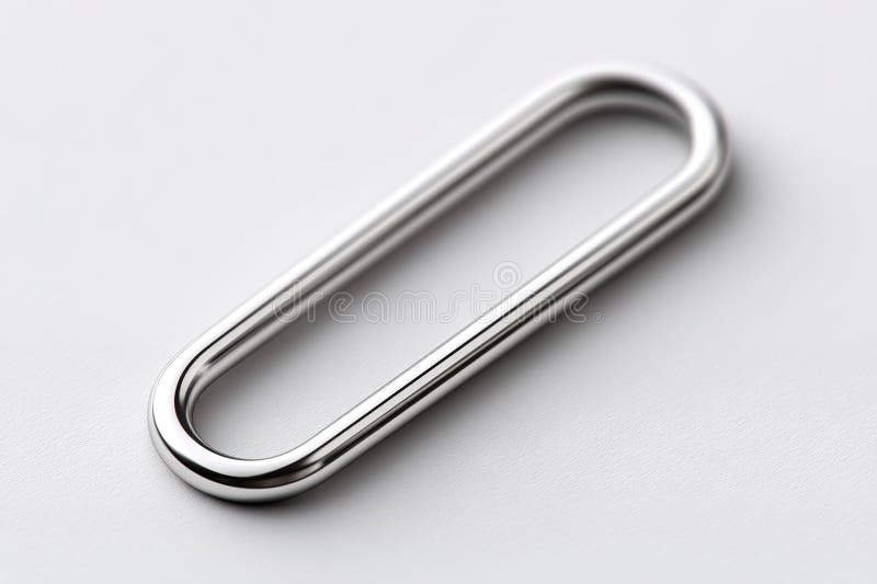 Metal Paper Clip on a Smooth Surface Showing Its Sleek Design and ...