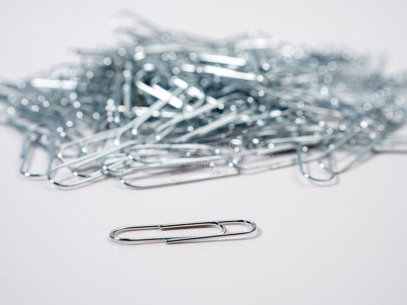 Metal Paper Clips on a White Background. Stock Photo - Image of ...