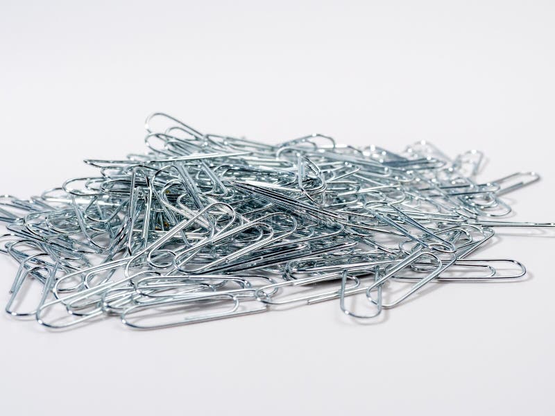 Metal Paper Clips on a White Background. Stock Image - Image of supply ...
