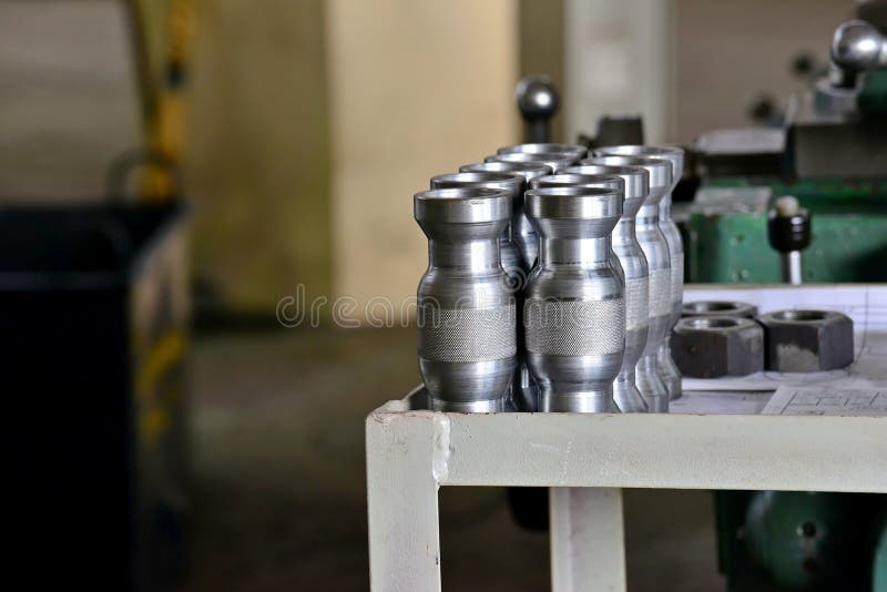 Metal Part with a Notch after Turning on a Rack Near the Machine Stock ...