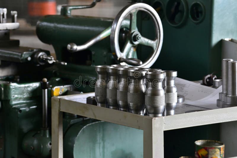 Metal Part with a Notch after Turning on a Rack Near the Machine Stock ...