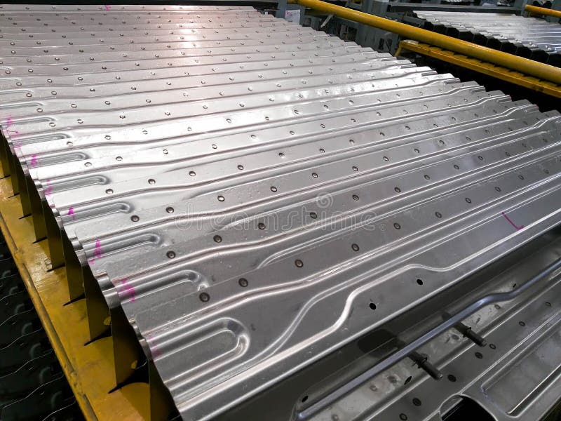 The Metal Parts in the Rack Line Up in a Pattern Stock Photo - Image of ...