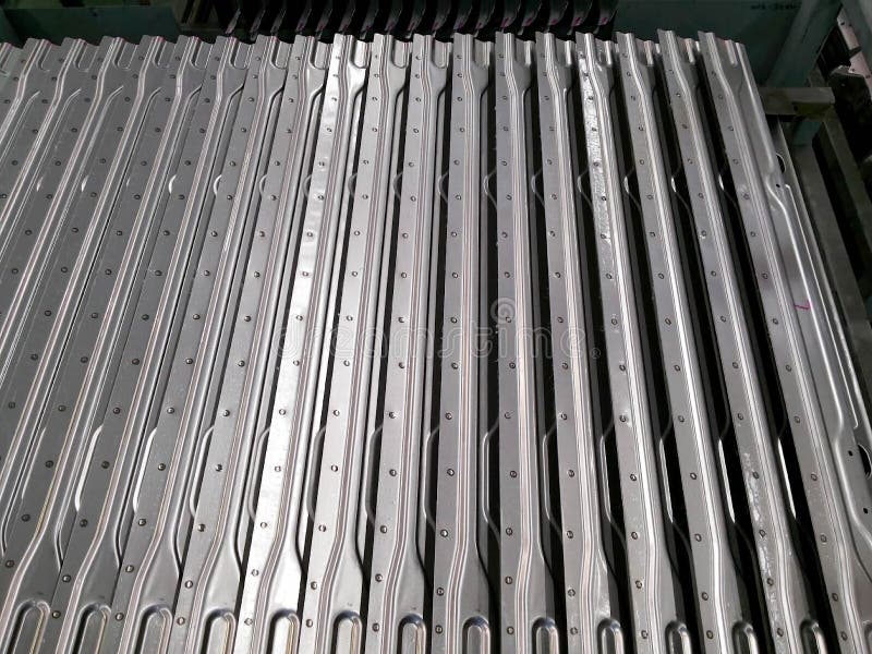 The Metal Parts in the Rack Line Up in a Pattern Stock Image - Image of ...