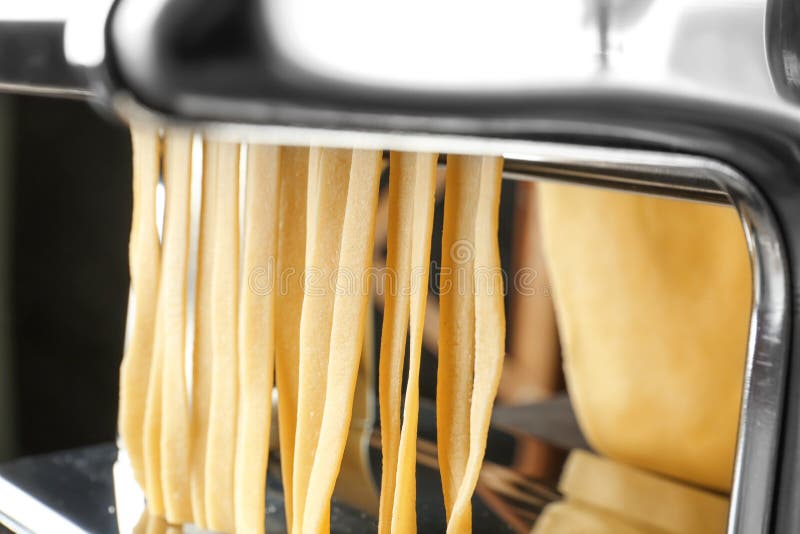 Metal Pasta Maker with Dough, Closeup Stock Image - Image of equipment ...
