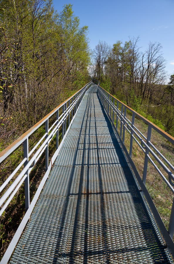 A Metal Pedestrian Bridge Over the Reuss River Below the Hydroelectric ...