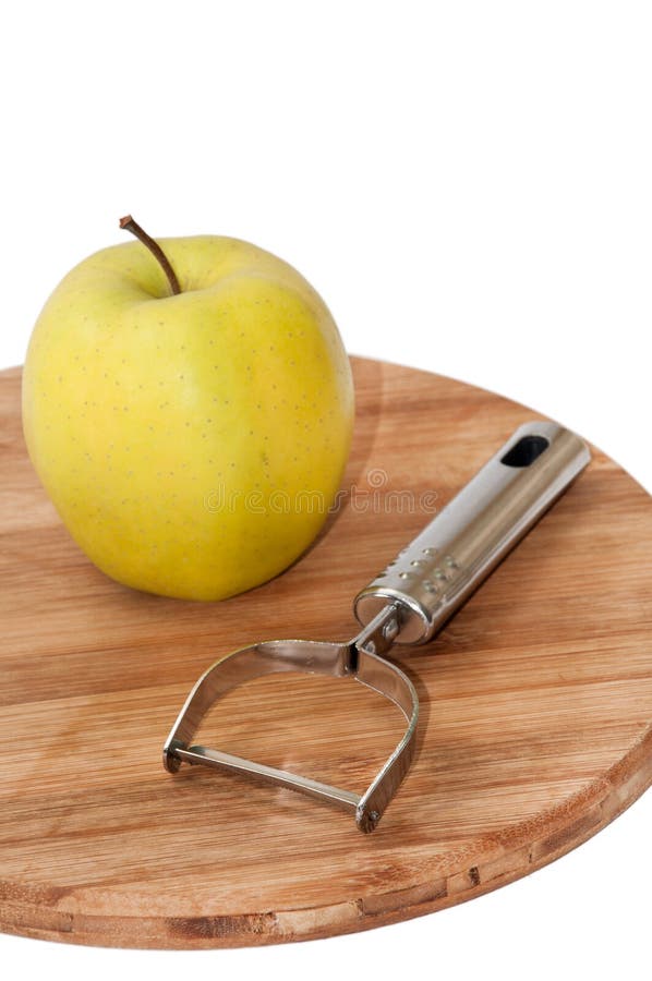 Metal Peeling Tool with Apple on the Board Stock Photo - Image of ...