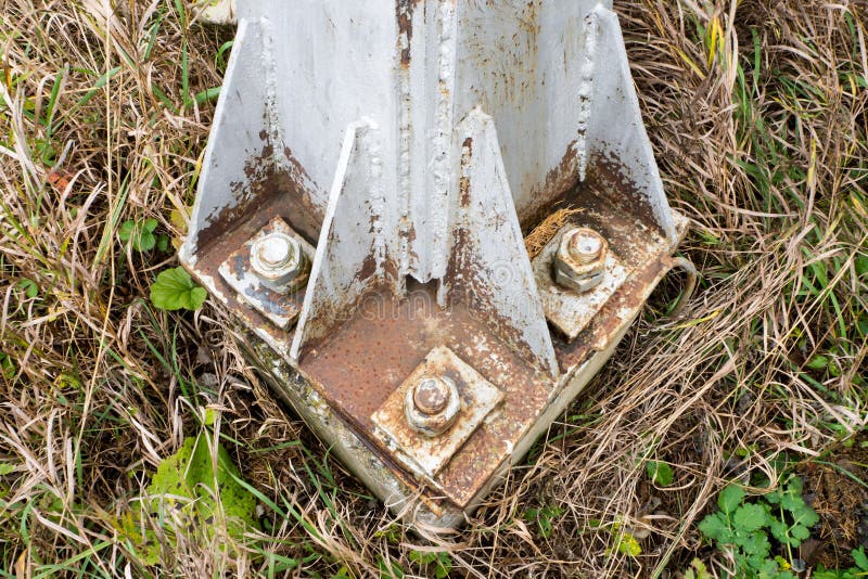 Metal Pillar Fastened To Basement with Anchor Bolts and Nuts. Stock ...