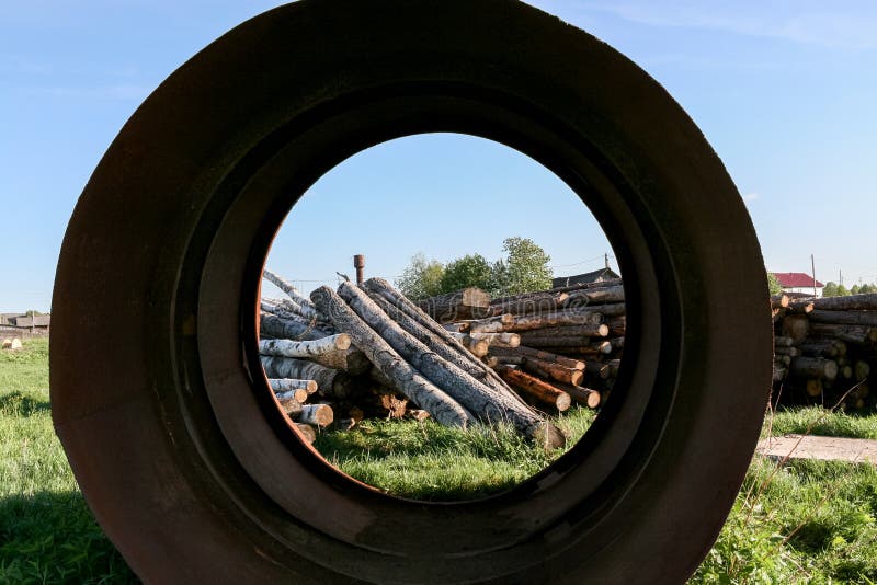 Metal Pipe of Large Diameter, through Which is Visible Heap of Piled ...