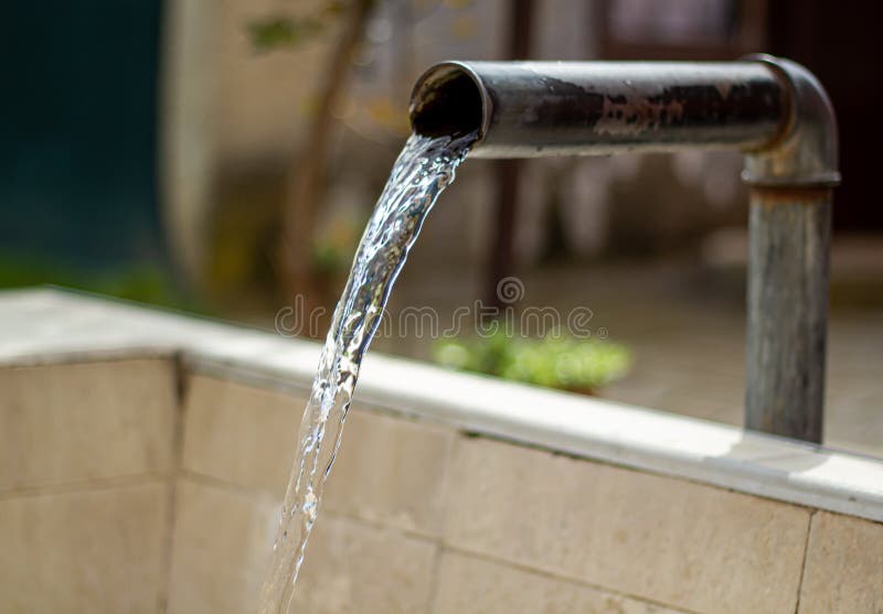 Stream from Steel: Water S Journey Stock Photo - Image of weathered ...