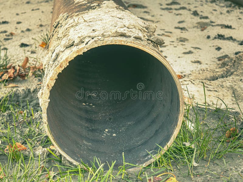Metal Pipe Stack on Soil. Rounded Iron Pipe Shape Ready for Use Stock ...