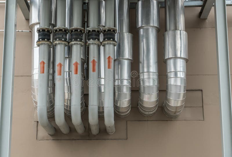 Metal pipe on the wall stock image. Image of industrial - 76248055