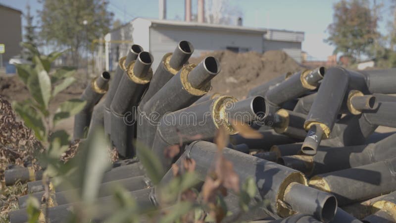 Metal Pipes in Polyurethane Foam Insulation Lying on Ground Stock ...