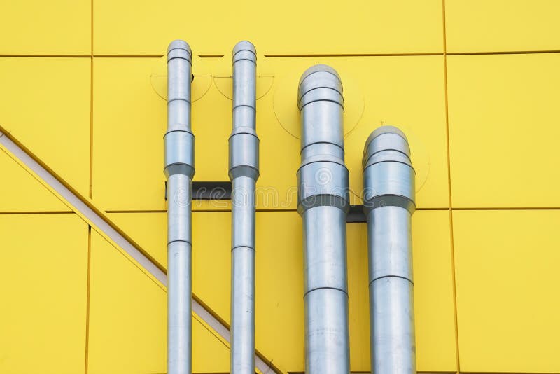 Metal Pipes with Manometers and Valves on the Yellow Wall Stock Photo ...