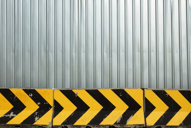 Metal Plate Fence and Concrete Barrier Stock Image - Image of grunge ...