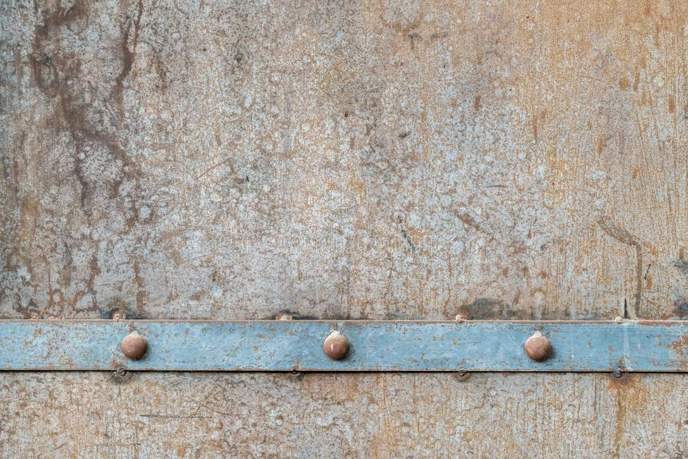 Metal plate riveted stock image. Image of rivet, metallic - 77256071