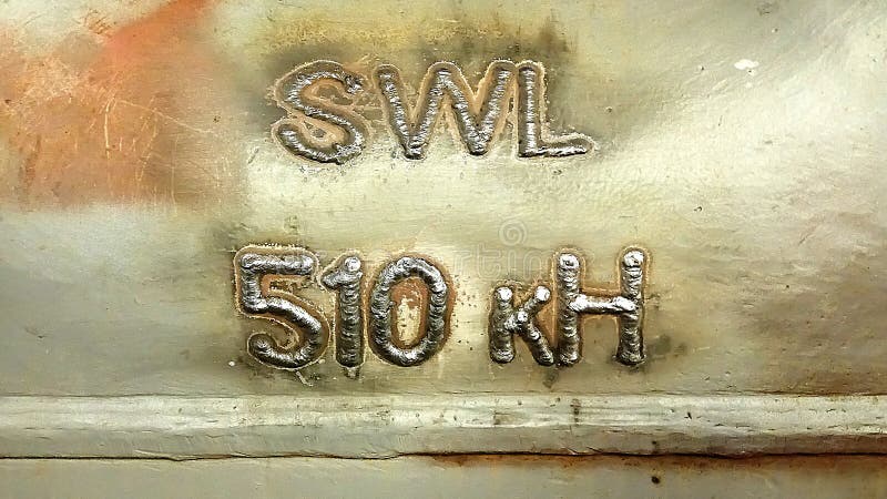 Metal Plate with Welded Technical Letters Stock Photo - Image of ...