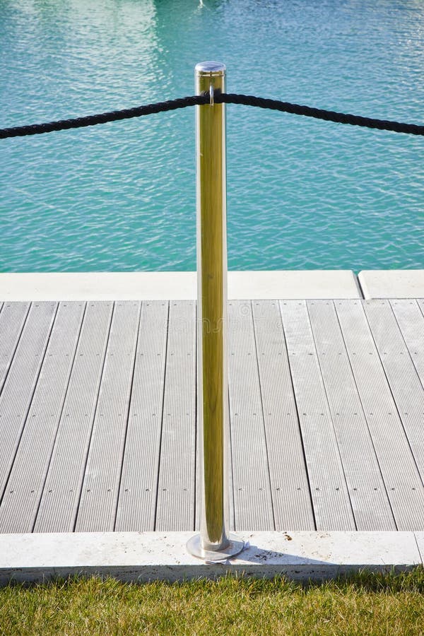 Metal Pole with Black Rope Isolated on Blue Backgrpund Stock Image ...