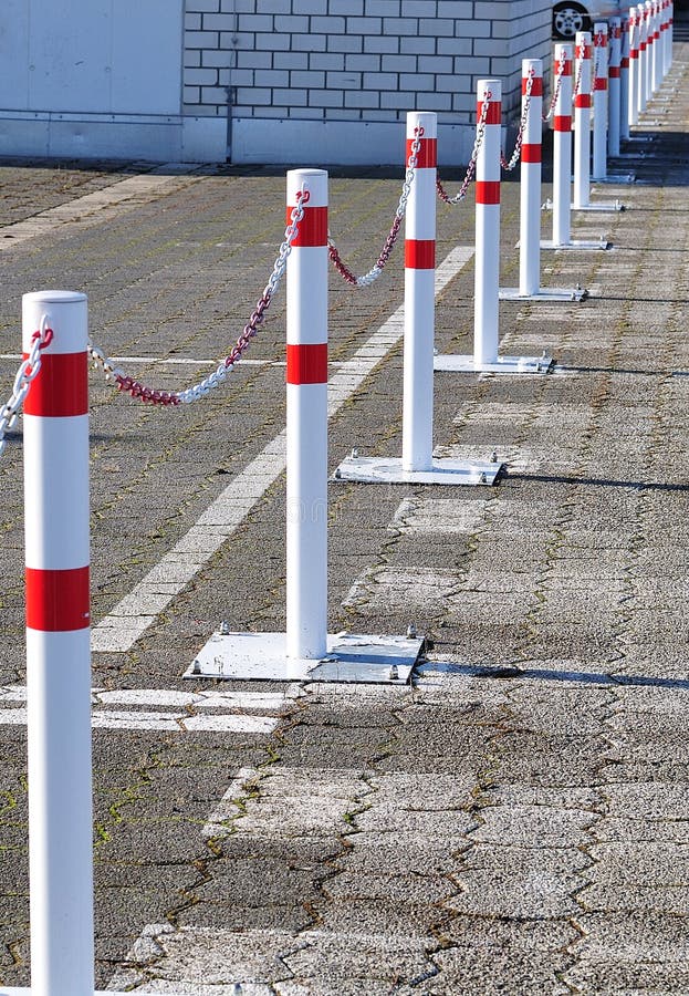 Metal Posts in Row Linked with Chain Stock Photo - Image of pole ...