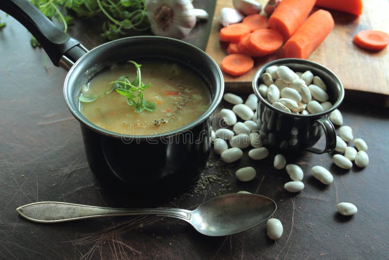 Metal pot with bean soup stock image. Image of appetizer - 64444615