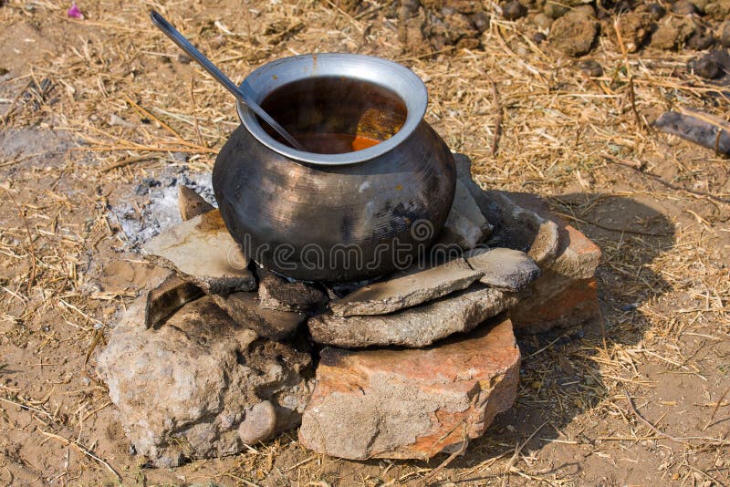 Metal Pot with Food on Fire, India Stock Photo - Image of earthenware ...