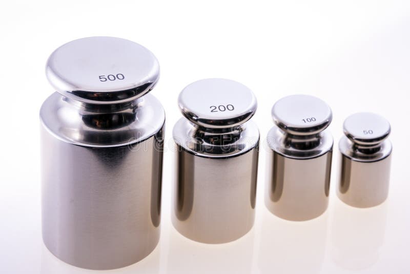 Metal Precision Weights of Different Denominations. Sharpness at the ...