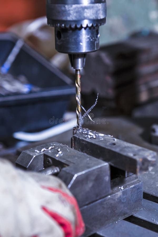 Metal Processing Concepts. Hands of Fitter Man Using Metal Drilling ...