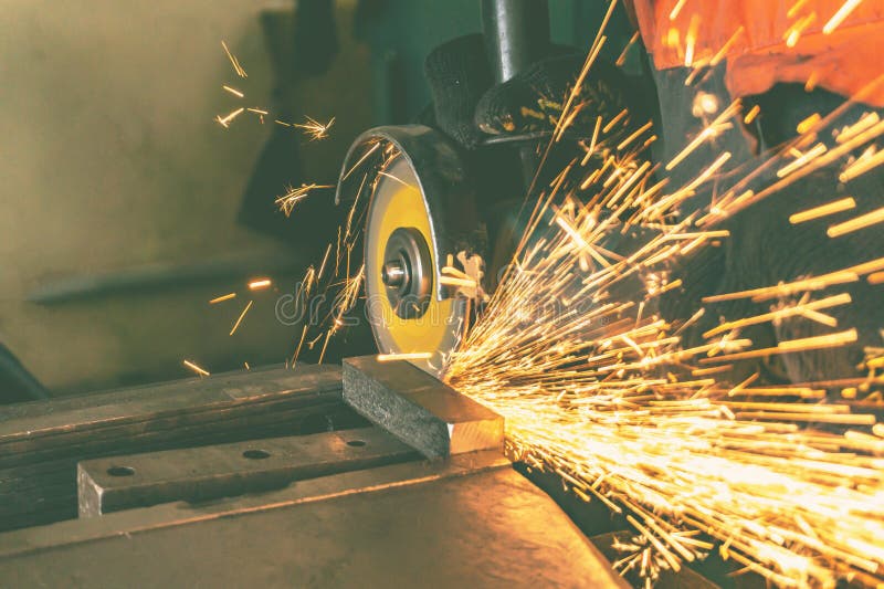 Metal Processing by Manual Action Grinding Machine with Flying Sparks ...