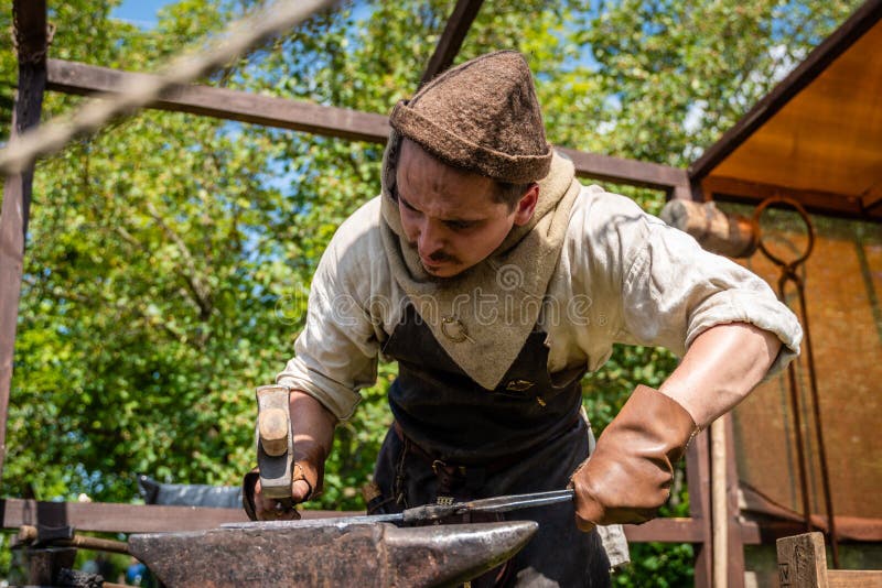 A Blacksmith Makes a Knife Blade Stock Image - Image of blacksmith ...