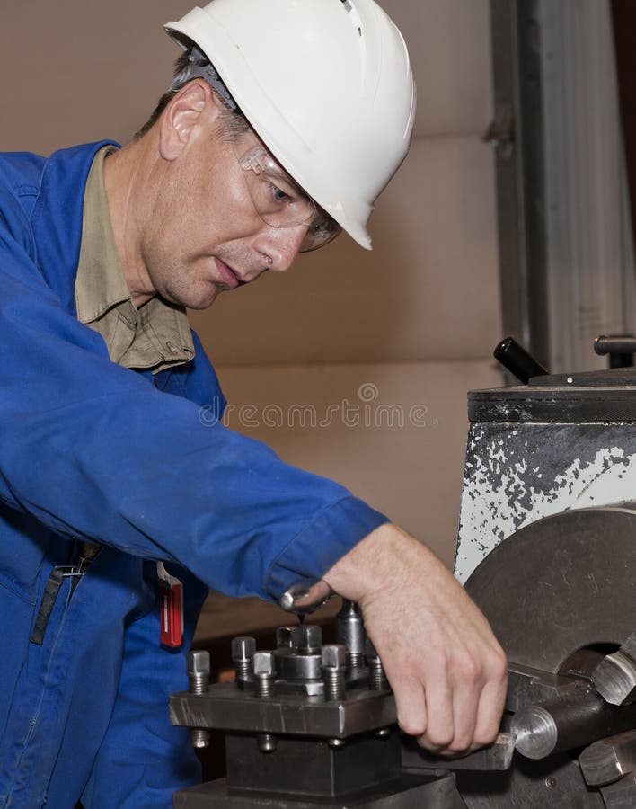 Metal Processing.worker Works on a Lathe Stock Photo - Image of ...