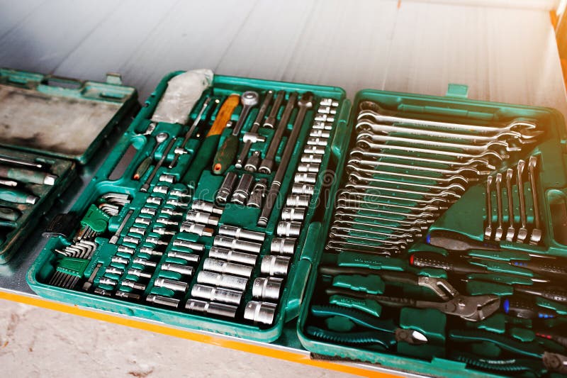 Rack of Spanners Hanging on a Wall Over a Workbench Stock Photo - Image ...
