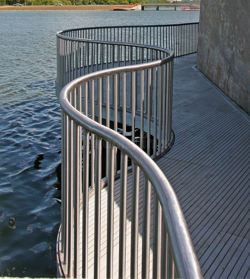 Metal railing by the water stock image. Image of handrail - 591741