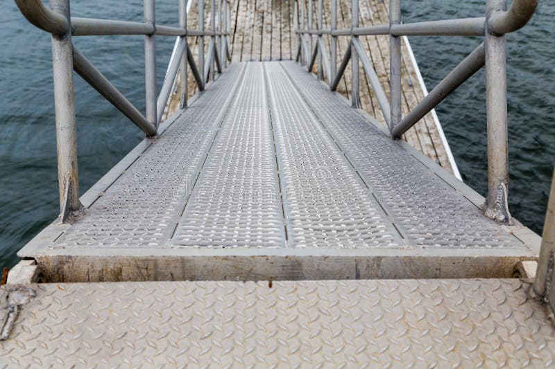 Metal Ramp to Dock stock photo. Image of marina, metallic - 67090120