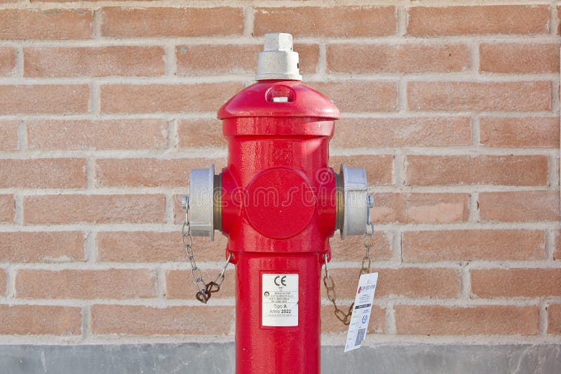 Metal Red Paint Fire Hydrant in a Urban Area Stock Photo - Image of ...