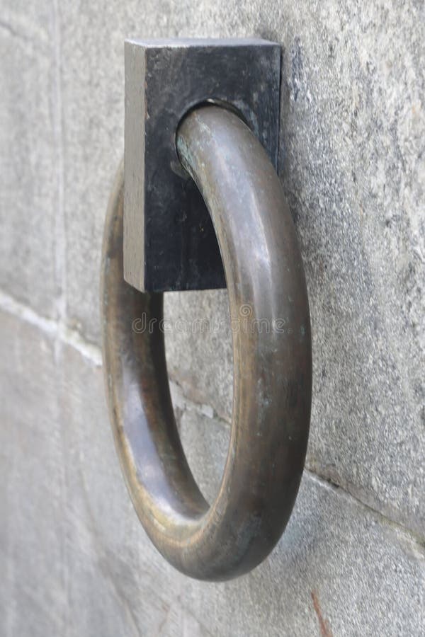 The Metal Ring in the Granite Wall Symbolizes the Chains of Non-freedom ...