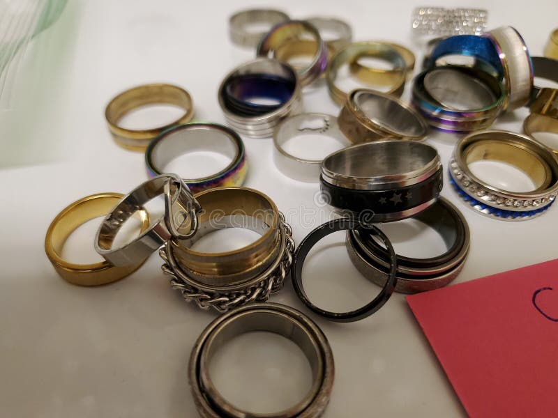 Metal rings in a pile stock image. Image of silver, necklace - 209642811