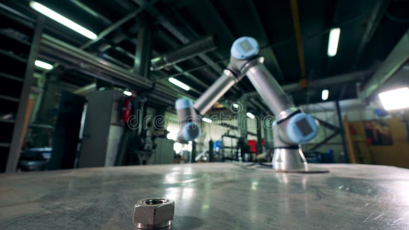 Metal Robotic Arm Moves, Working with a Small Gear. Stock Video - Video ...