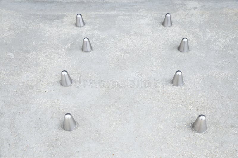 Metal Rounded Spike on Concrete Background Stock Photo - Image of ...