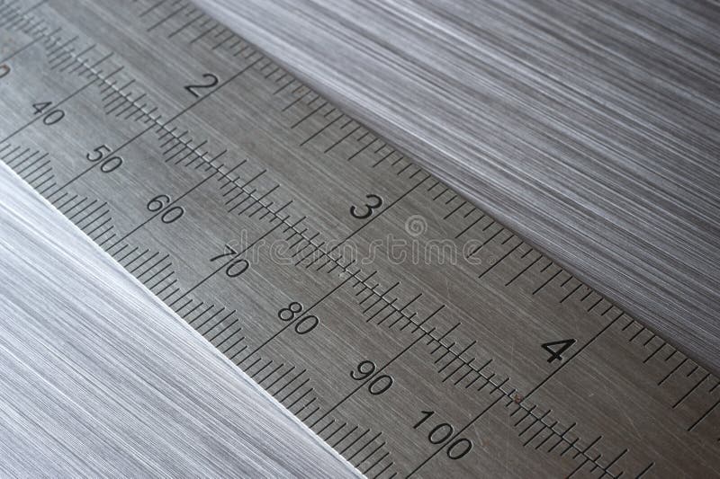Metal Ruler with Protractor and Pencil on Wood Angled Stock Photo ...