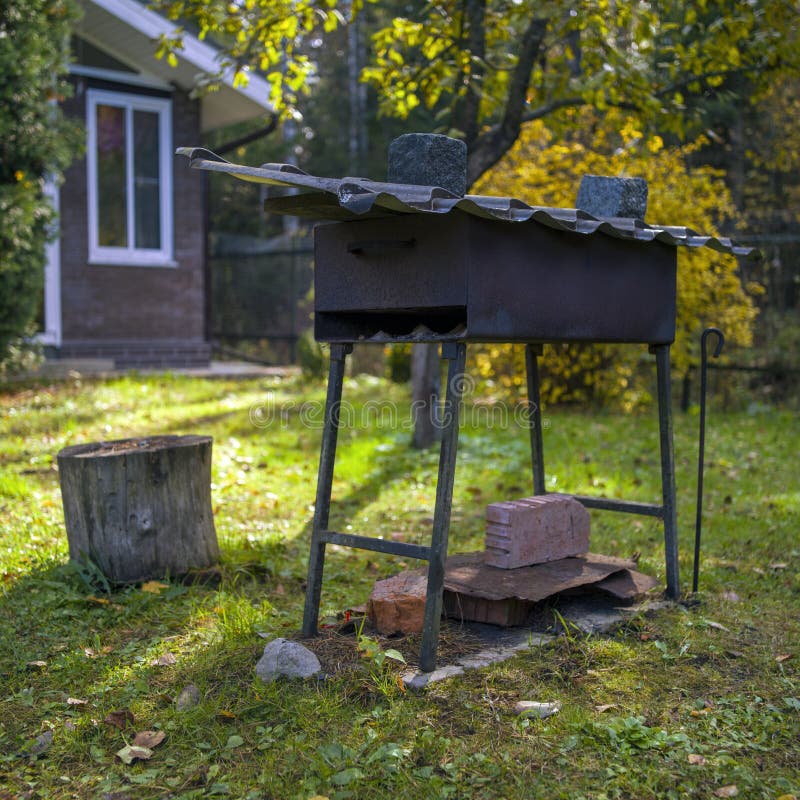 Old rusty barbecue grill stock image. Image of fireplace - 269806061