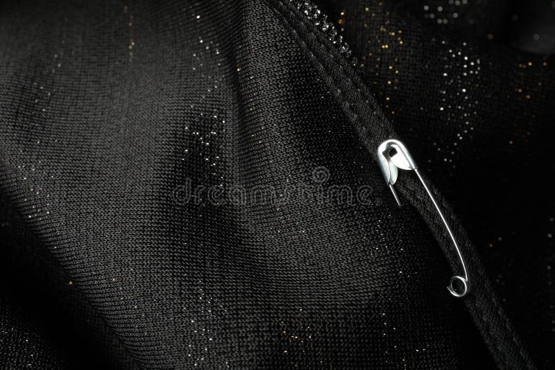 Metal Safety Pin on Black Fabric, Closeup Stock Photo - Image of ...