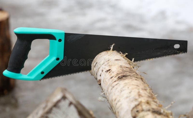 Metal Saw in a Log. Close-up. Stock Image - Image of metal, jeans ...