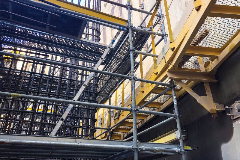 Metal Scaffoldings at Construction Site. Auxiliary Supporting ...