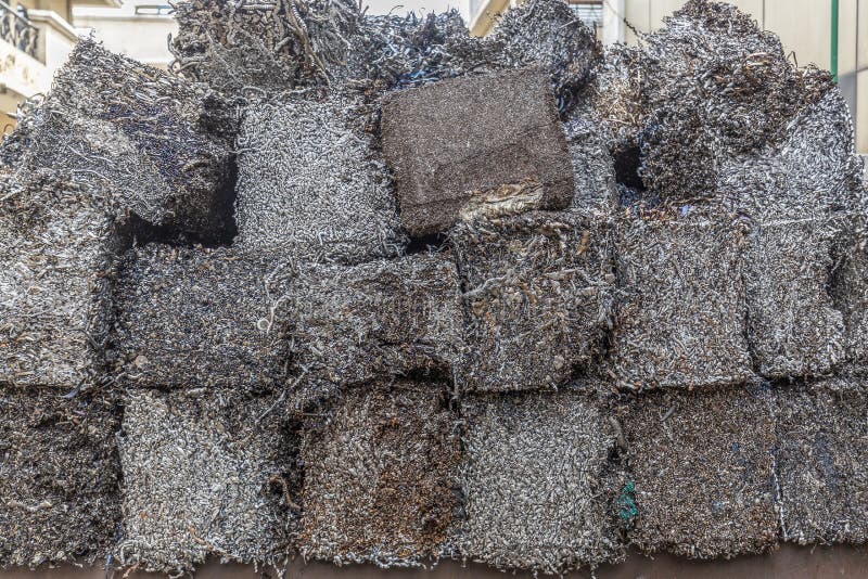 Metal Scrap Compressed into a Solid Metal Scrap Cubes, Ready for ...