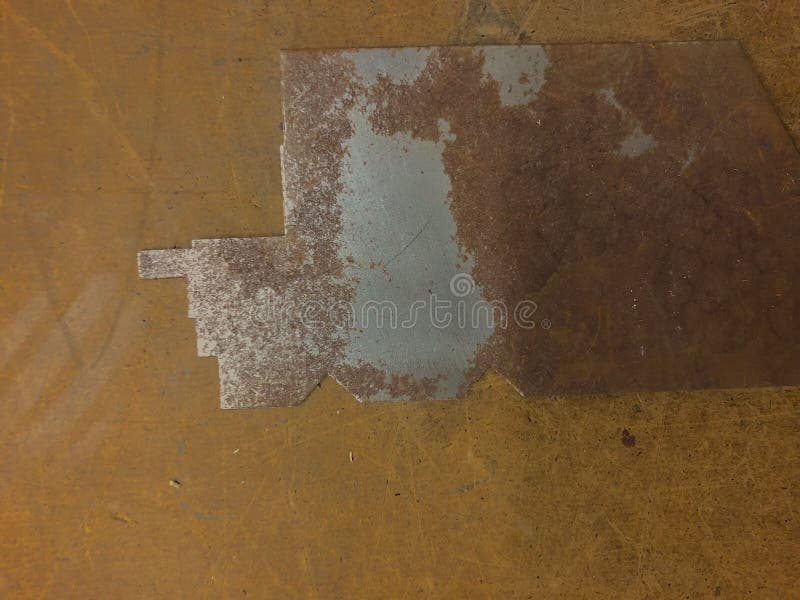 Metal Scrap on Wooden Table Stock Photo - Image of closeup, color ...