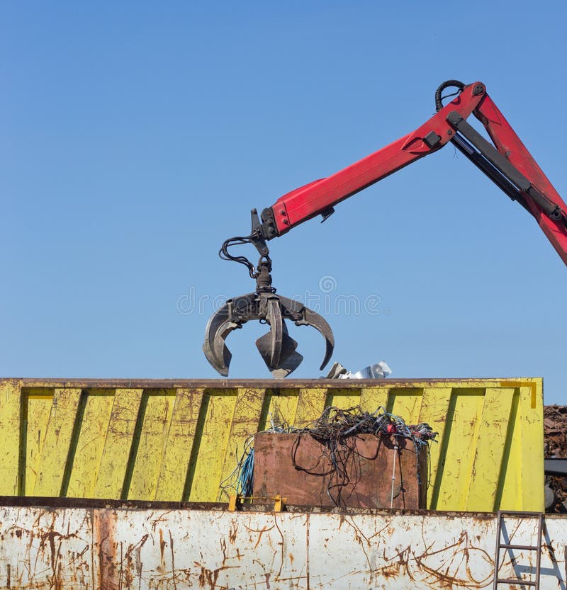 286 Scrap Yard Grabber Stock Photos - Free & Royalty-Free Stock Photos ...