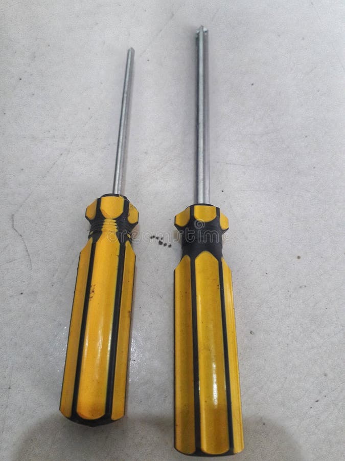 Screwdriver with Long Sleeve Stock Photo - Image of machine, weapon ...