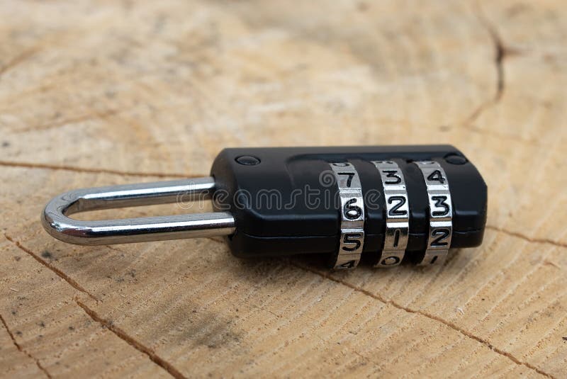 Metal Security Lock with Passcode on Wooden Table Stock Photo - Image ...